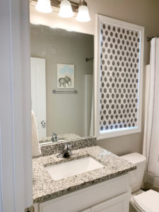 DIY: How to Frame A Builder-Grade Bathroom Mirror - Home and Hallow